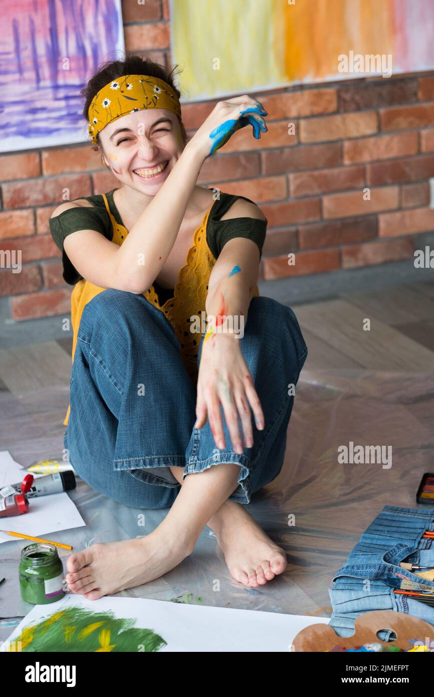 fun leisure creative young female artist paint Stock Photo - Alamy