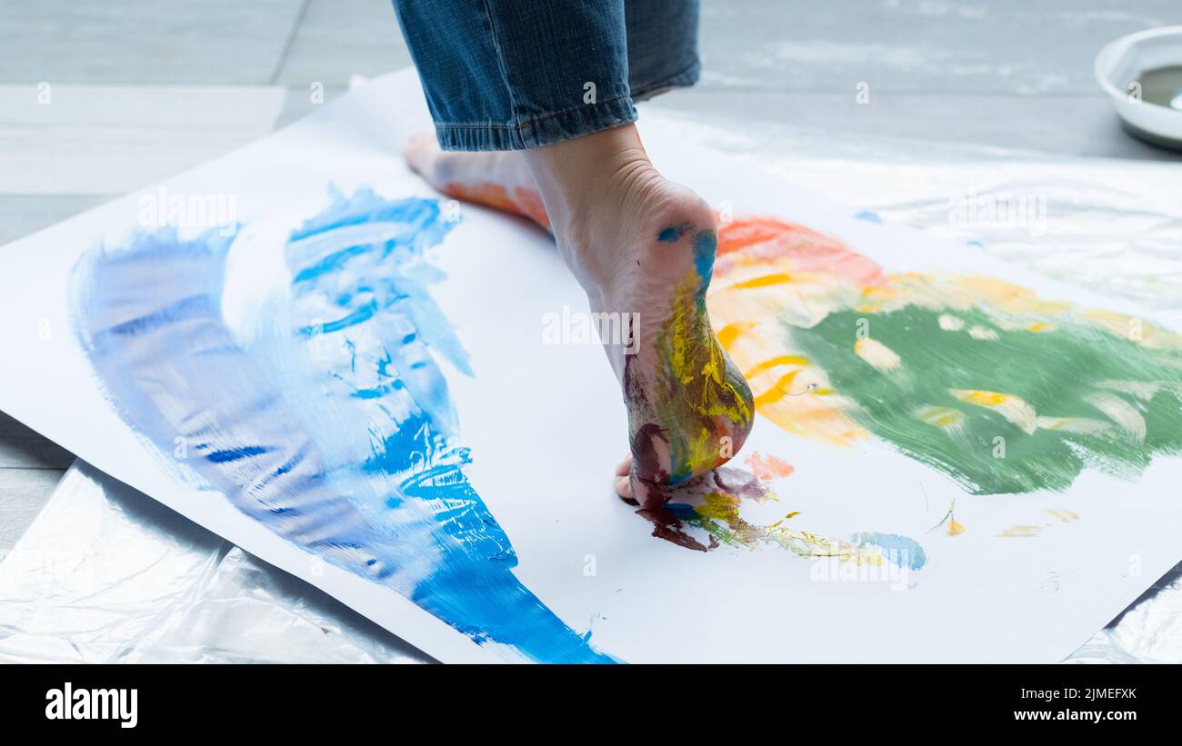 foot painting technique artist abstract artwork Stock Photo - Alamy