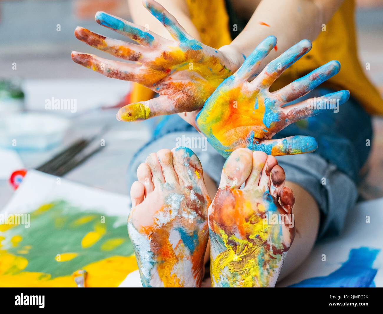fine art school feet hands multicolor paint Stock Photo - Alamy