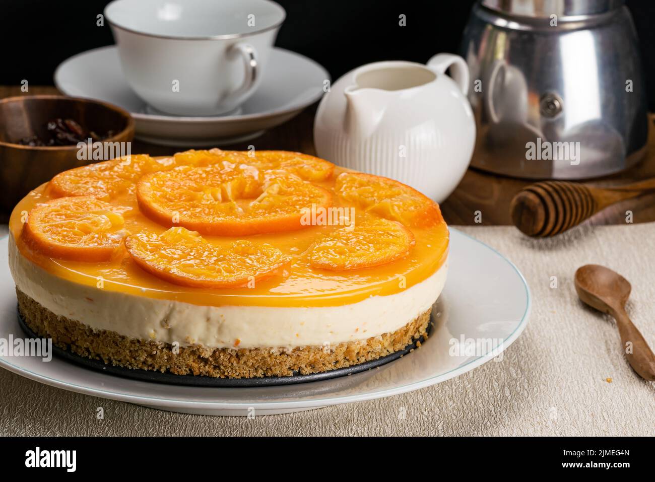 Side view of delicious homemade orange cheesecake Stock Photo - Alamy
