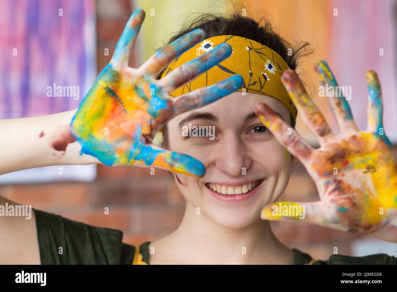 art therapy portrait female artist fun smiling Stock Photo - Alamy