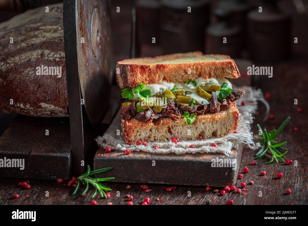 Spicy and tasty sandwich with gherkin, shredded beef , sauce and ...