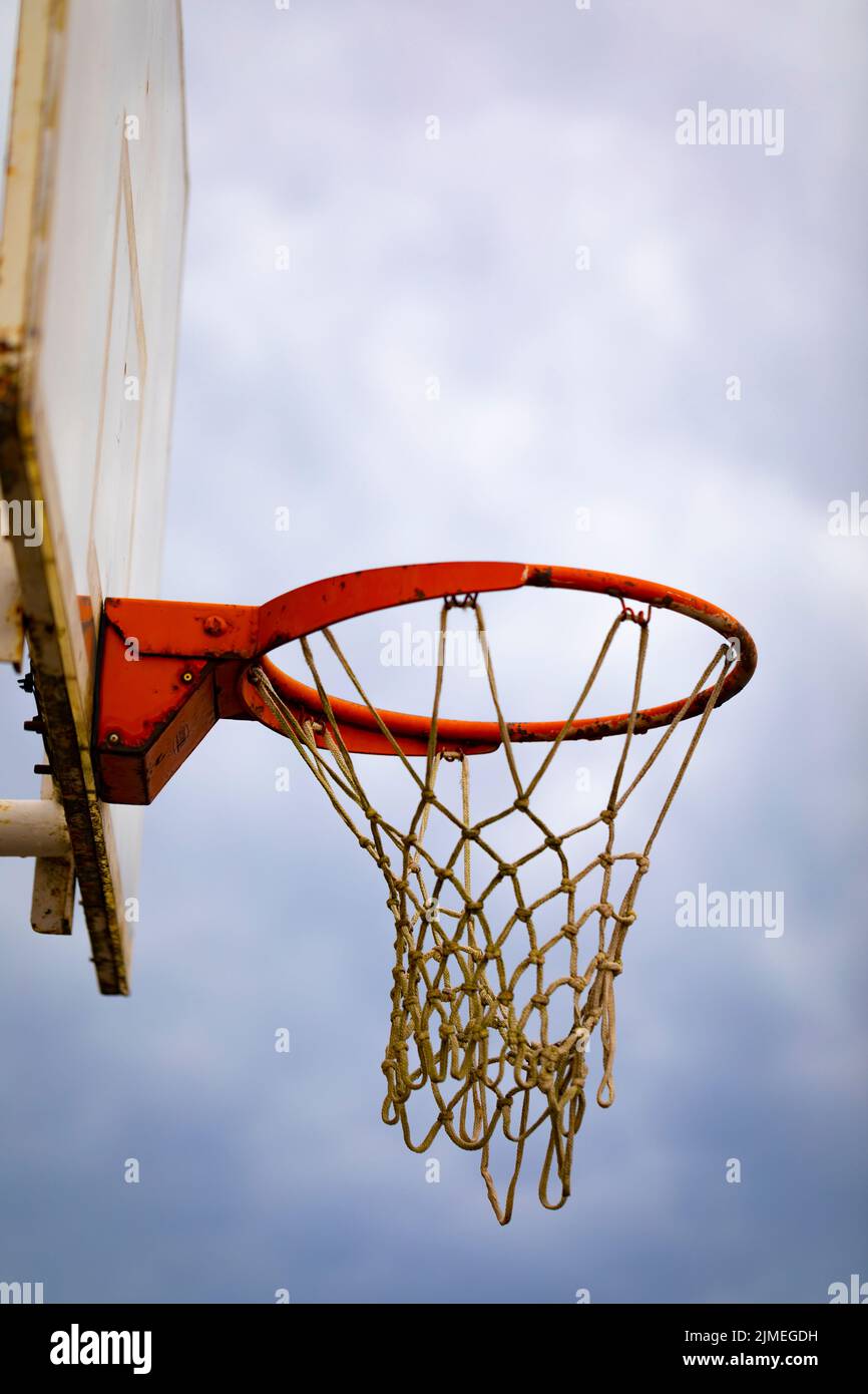 Outdoor basketball hoop on a stormy sky. Playground Stock Photo - Alamy