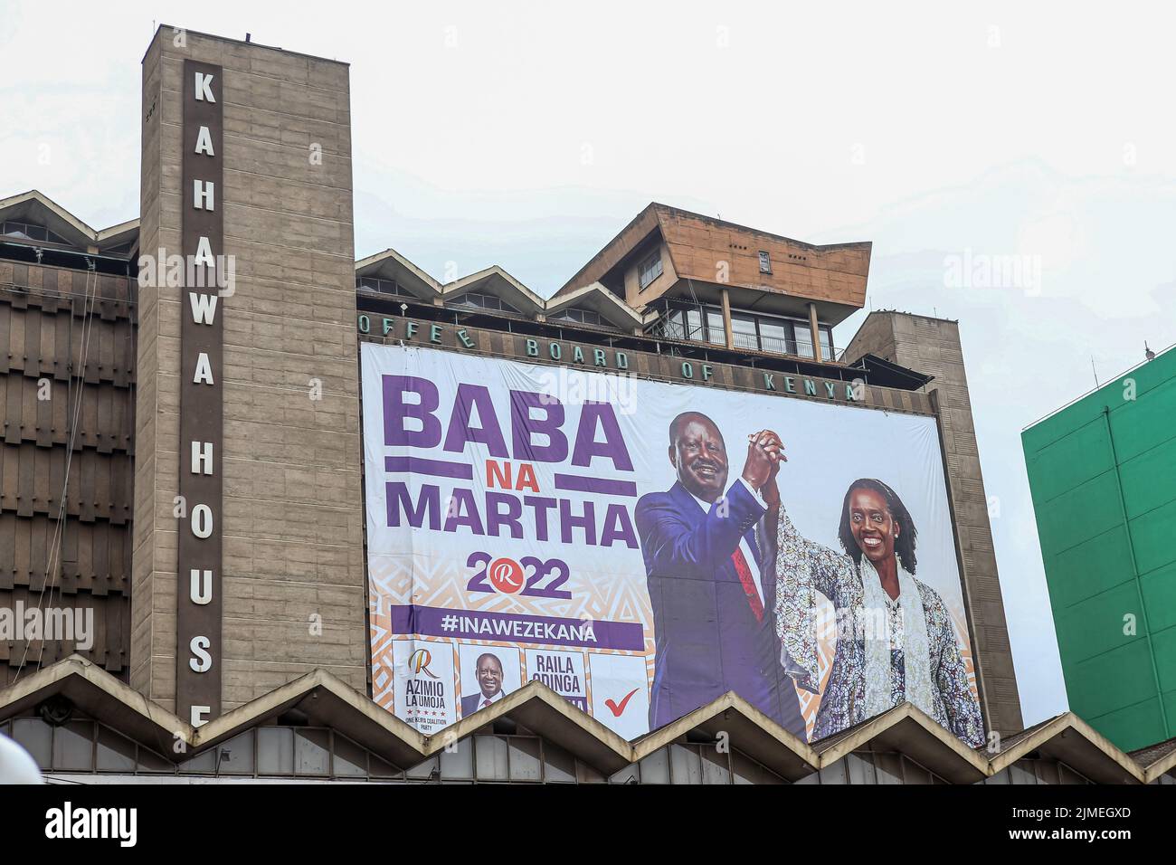 A Political campaign billboard with pictures of former prime minister ...