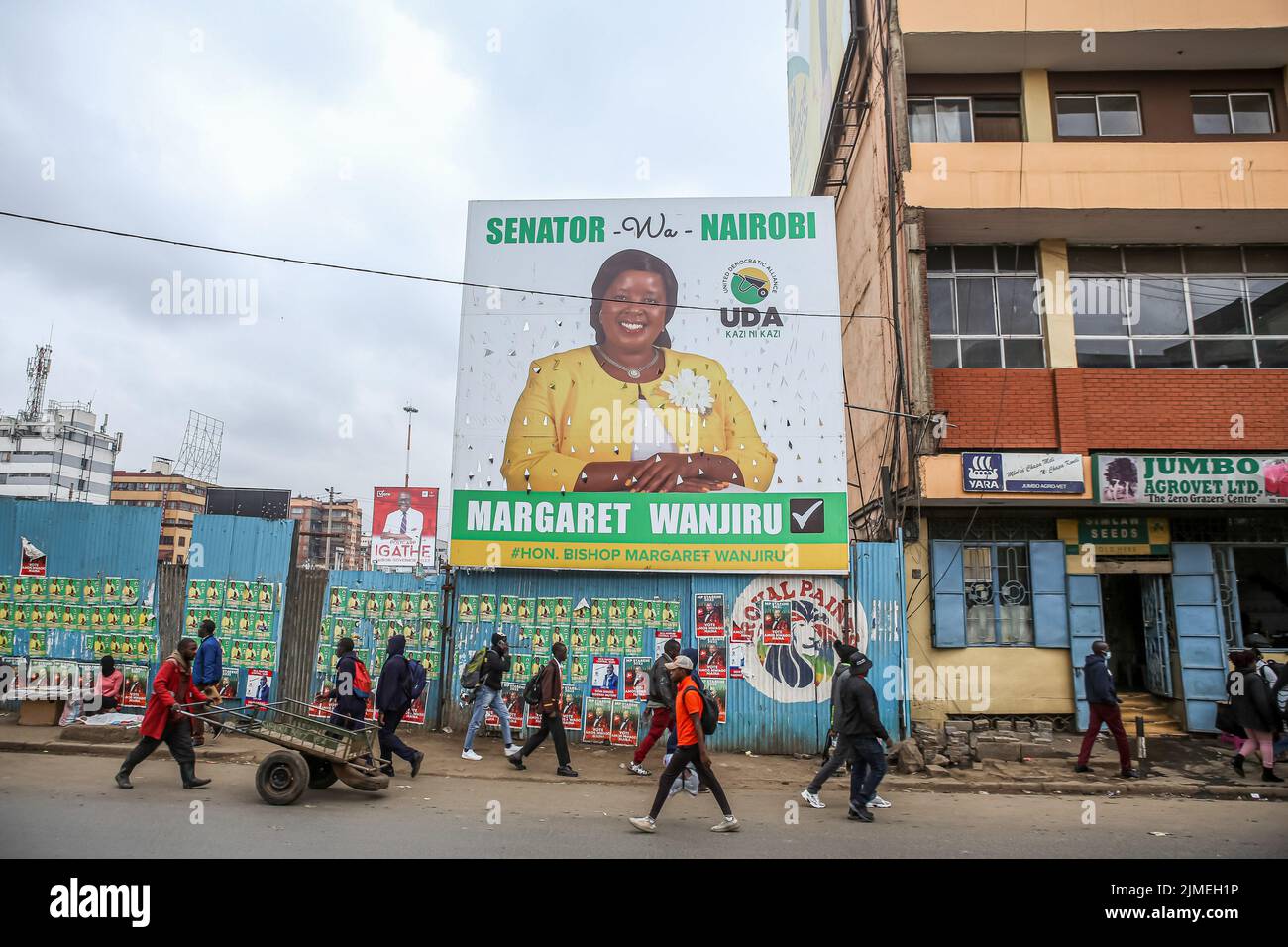 A Political campaign billboard with a picture of Margret Winjiru ...