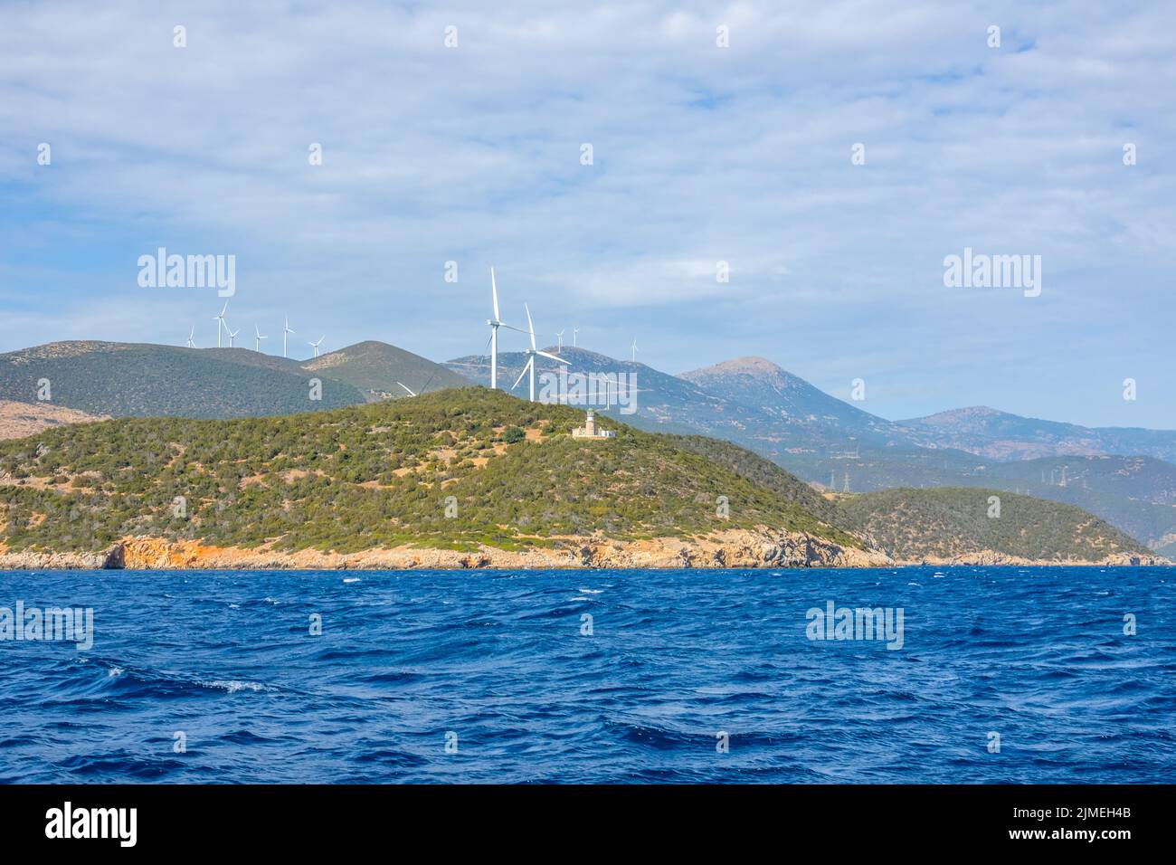 Wind Farms on a Hilly Shore and Lighthouse Stock Photo - Alamy