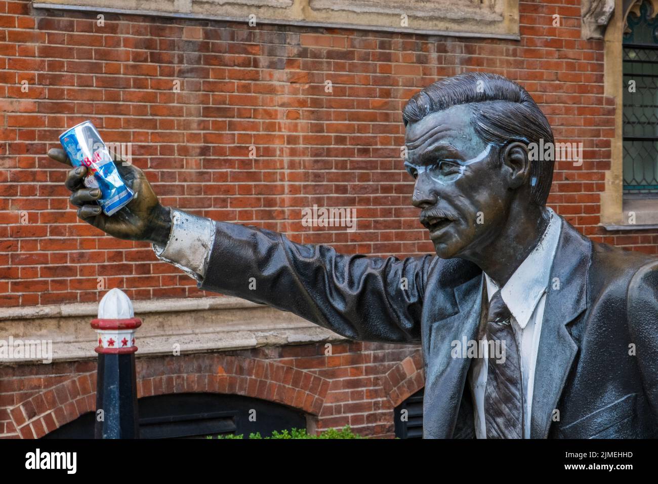 Seward Johnson's Statue of a man trying to catch a taxi home with an ...