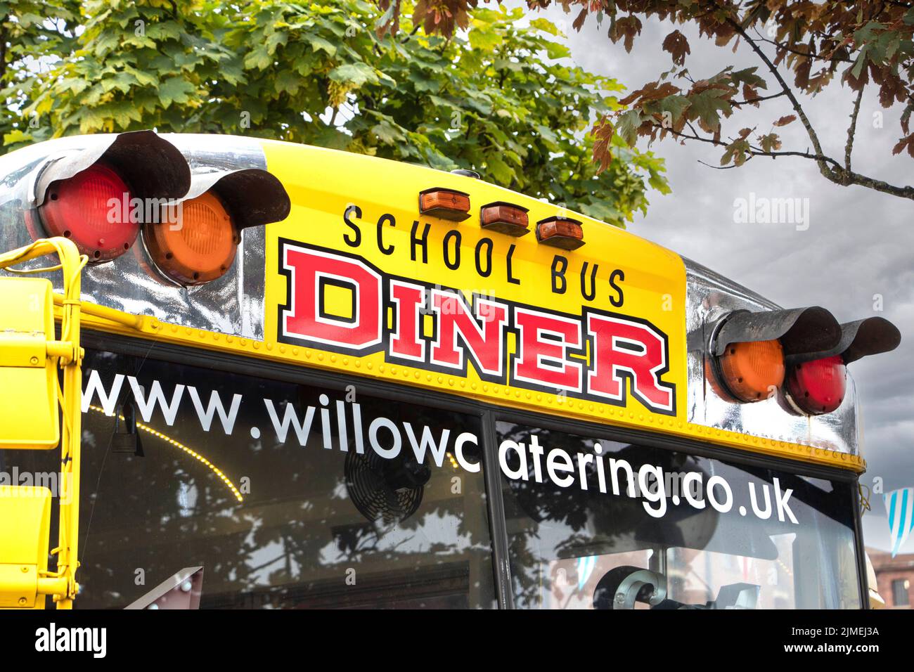 closeup of yellow american school bus repurposed as a mobile diner in ...