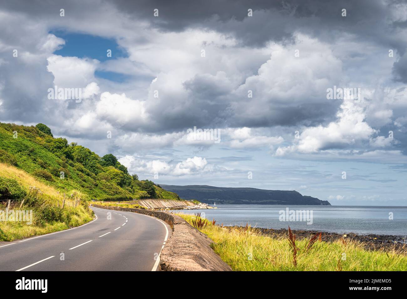 Winding road leading trough coastline, Wild Atlantic Way Stock Photo ...