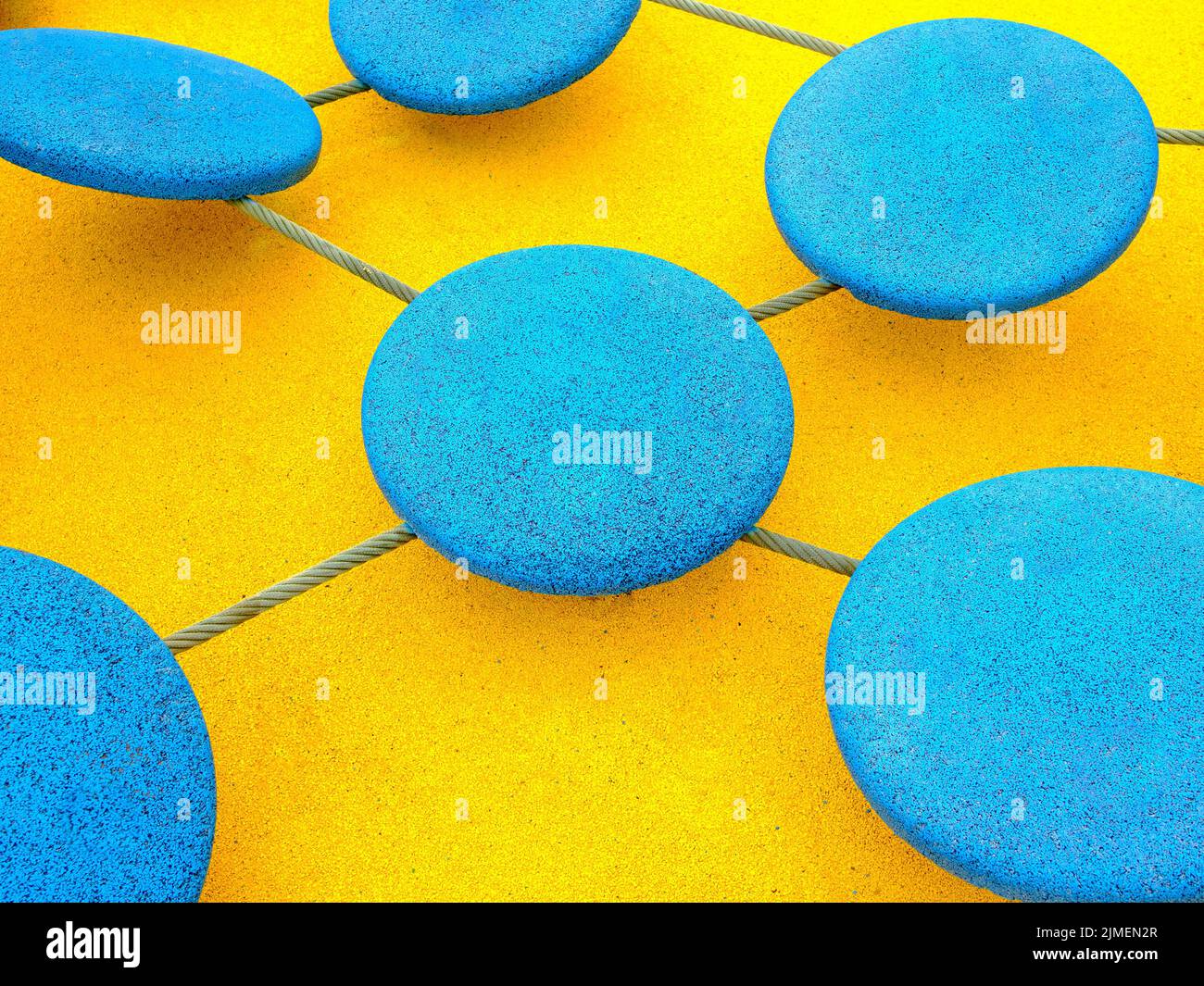 Blue circles connected by a rope on a bright yellow background Stock ...