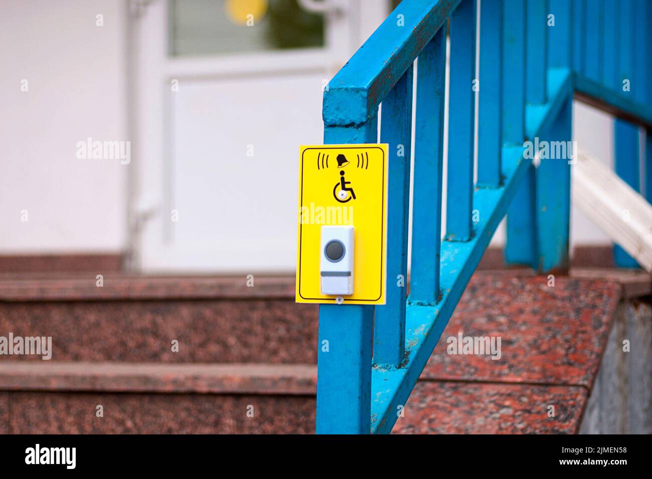 Bell button to call staff for wheelchair users near the pharmacy stairs ...