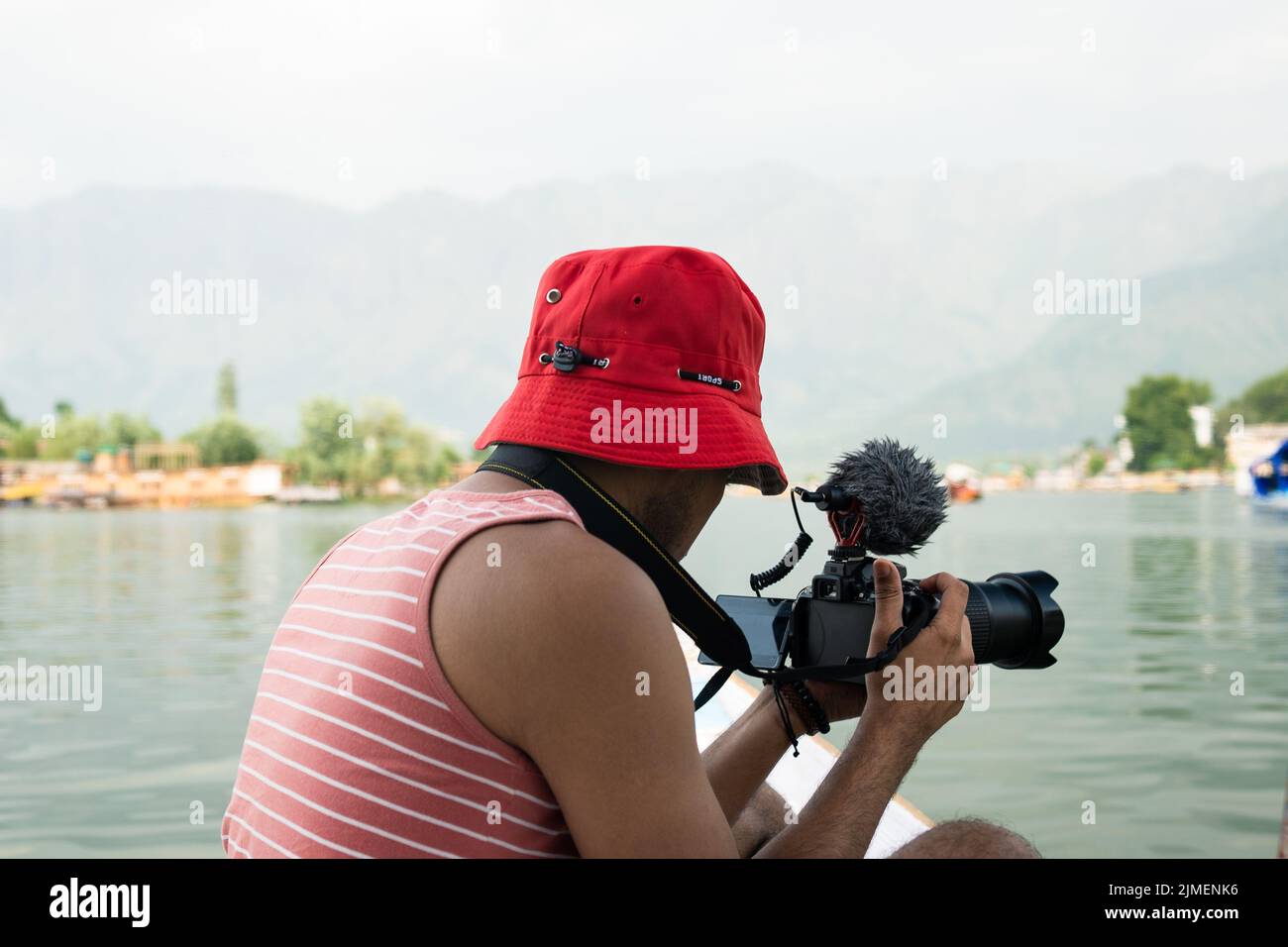 A photographer get ready to take a picture at Dal Lake Stock Photo - Alamy
