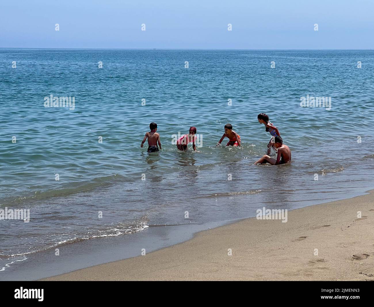 Diverse children group playing hi-res stock photography and images - Alamy