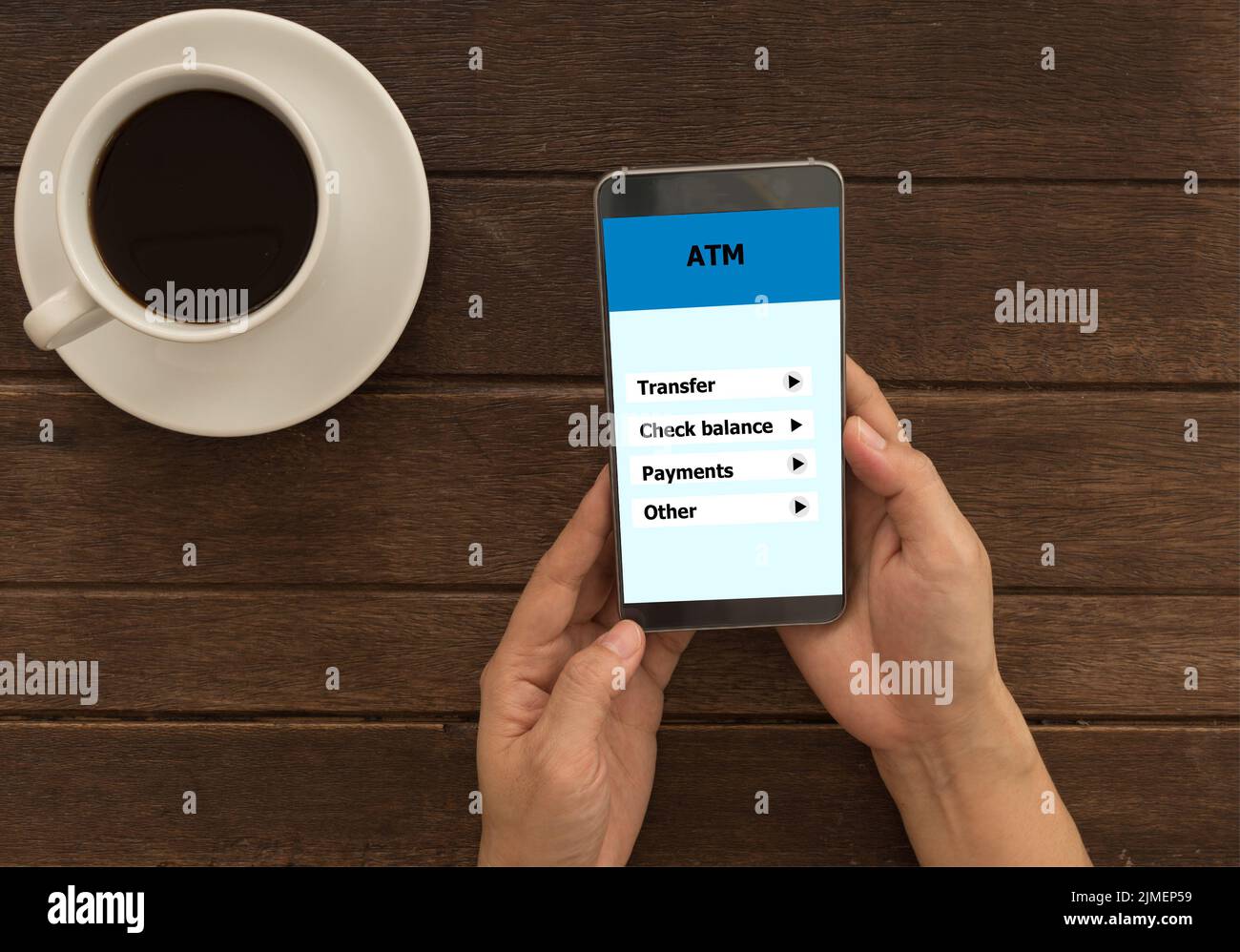 Human holding Use the phone to pay bills over the phone Stock Photo - Alamy
