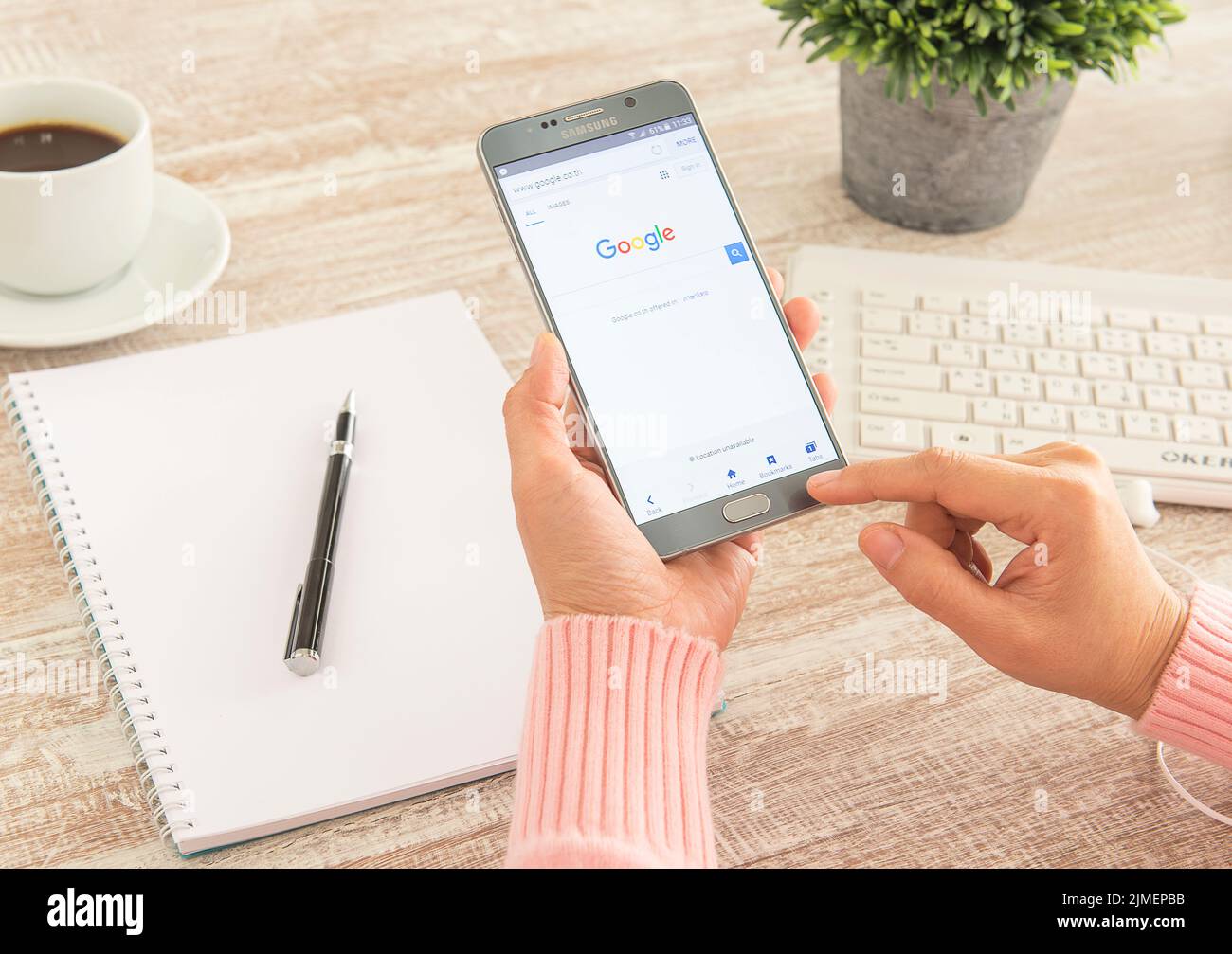 BANKKOK, THAILAND - FEBRUARY 10,2016: Human hands using a smartphone ...