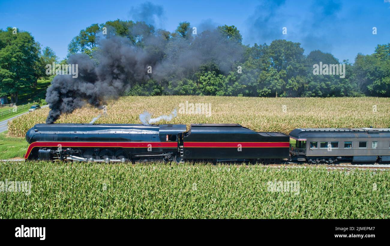 An Aerial View of an Antique Restored Steam Engine Blowing Smoke and ...