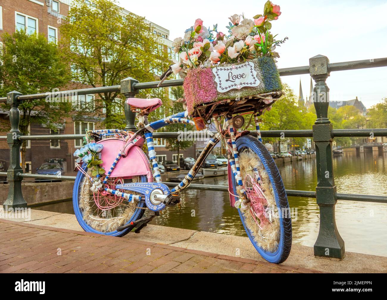 Love - Bicycle at the Railing of the Canal Bridge in Amsterdam Stock ...