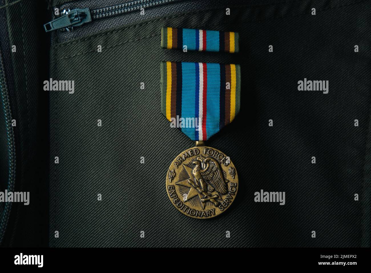 An authentic American expeditionary service medal hanging on uniform ...