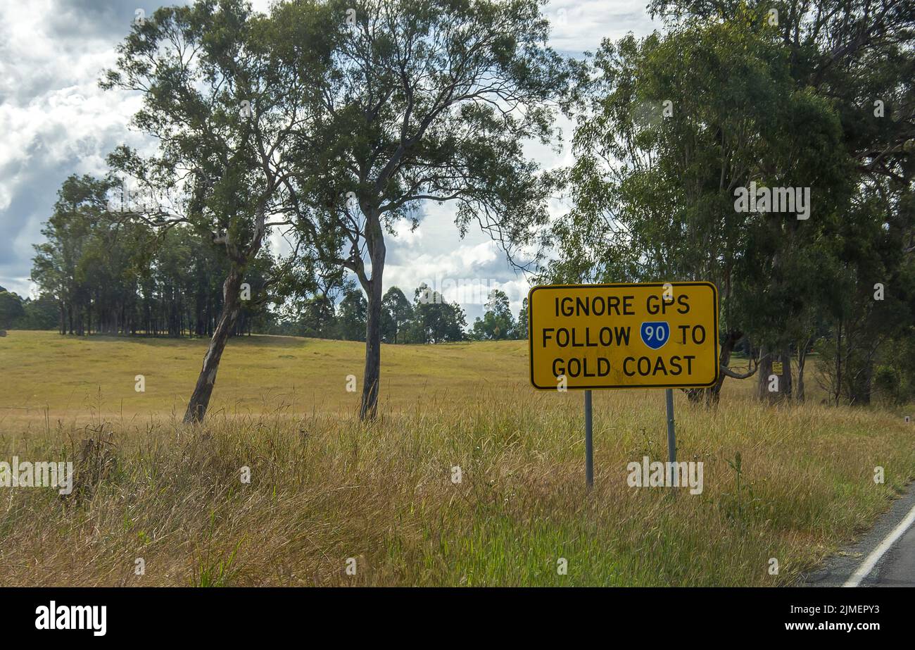 Rural Australian road sign near Beaudesert advising drivers to ignore ...