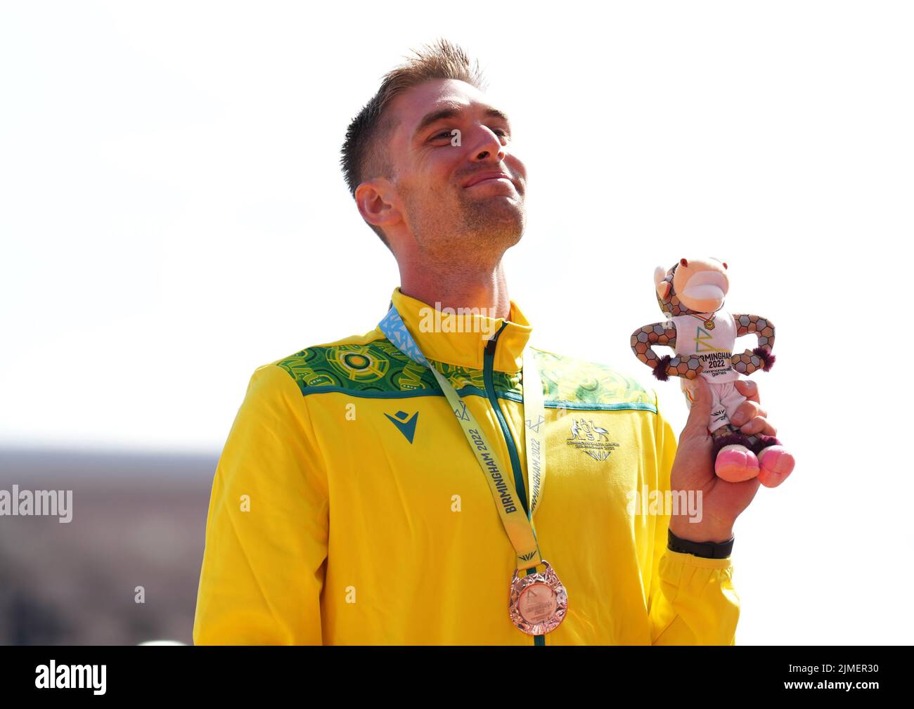 Australia's Cedric Gubler with her bronze medal after finishing third ...