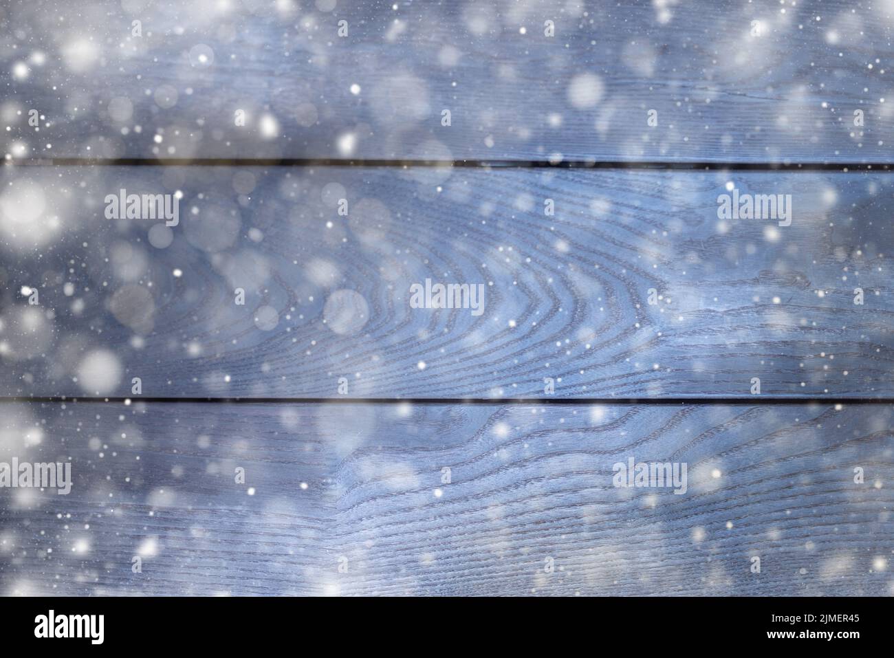 Flat lay of snow-covered wooden panel with copy space for yoir ideas ...