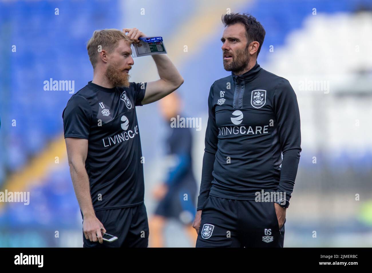 Danny Schofield manager of Huddersfield Town speaks with his coaching ... Danny Schofield manager of Huddersfield Town speaks with his coaching ...