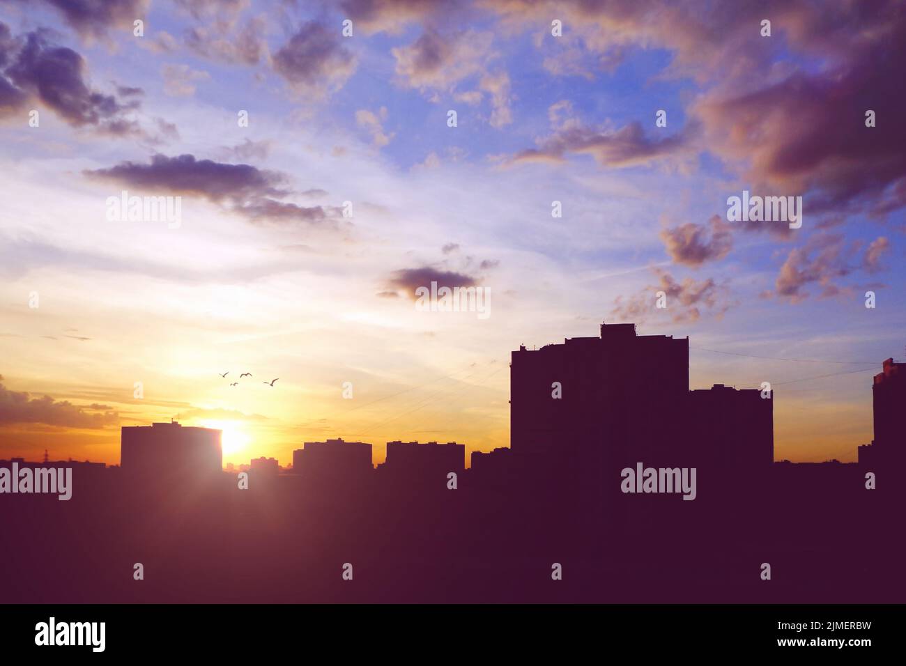 City skyline with buildings silhouettes in sunset sky Stock Photo - Alamy
