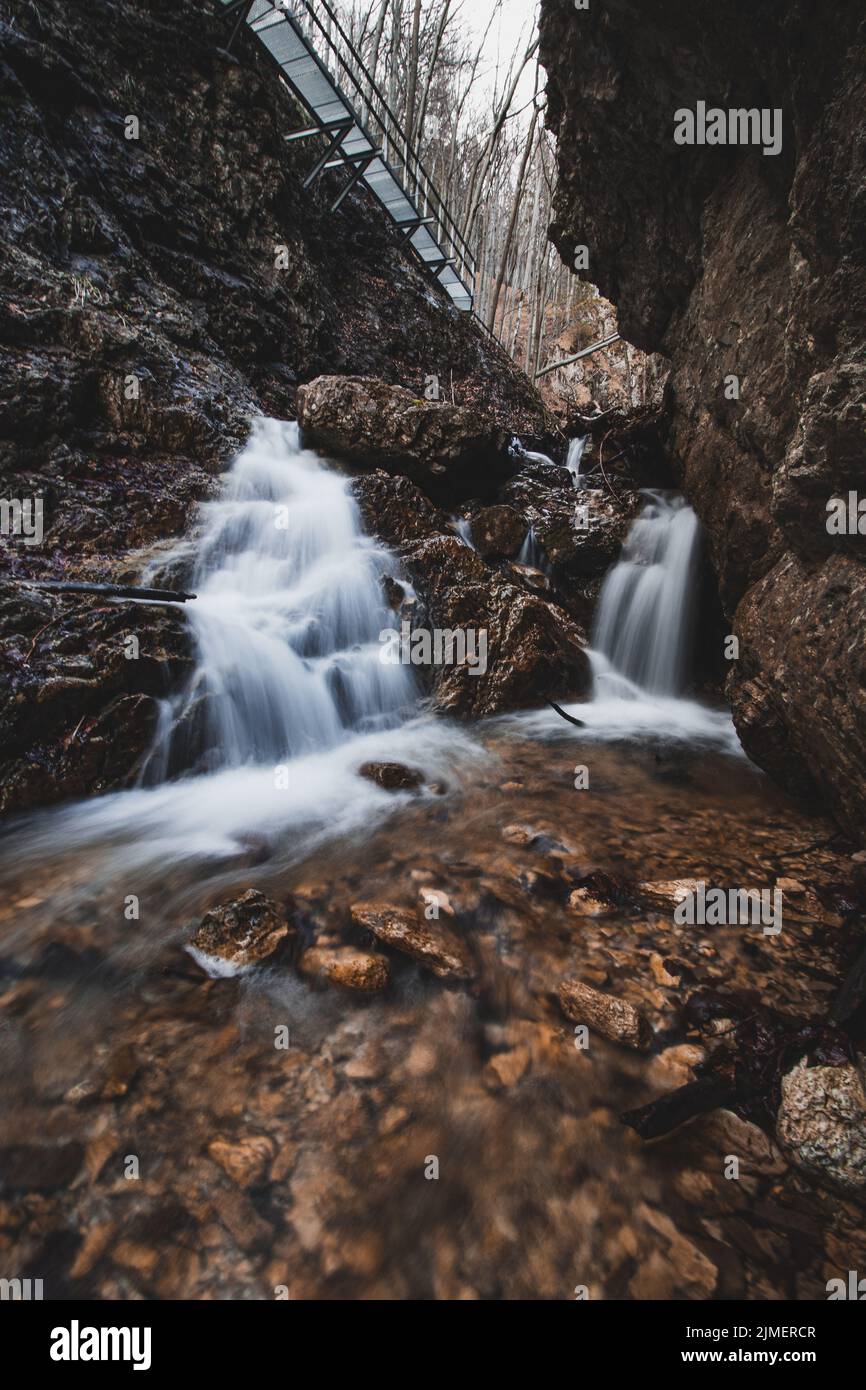 Beautiful white waterfalls in a rocky environment known as Janosikove ...