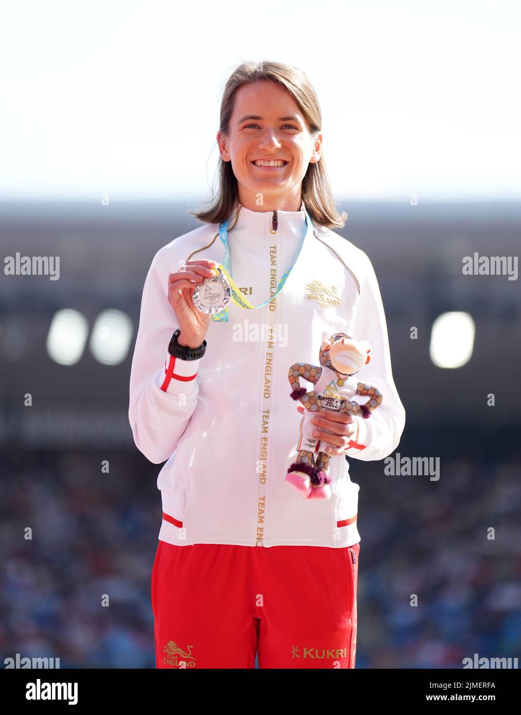England's Elizabeth Bird poses with her silver medal after finishing ...