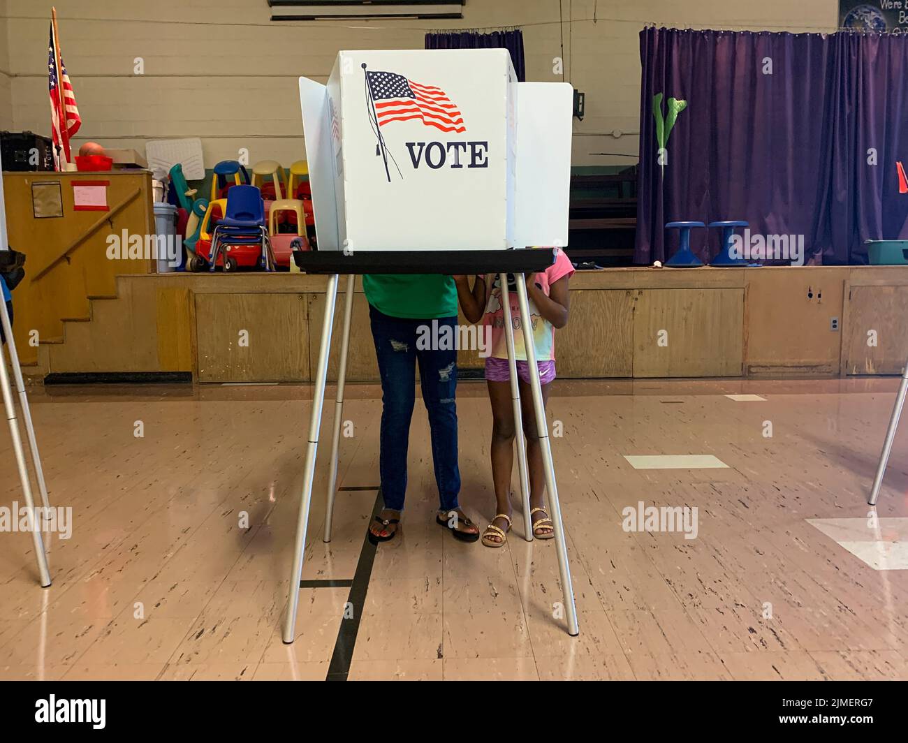 Lansing, Michigan, USA. 2nd Aug, 2022. A mom takes her daughter to vote ...
