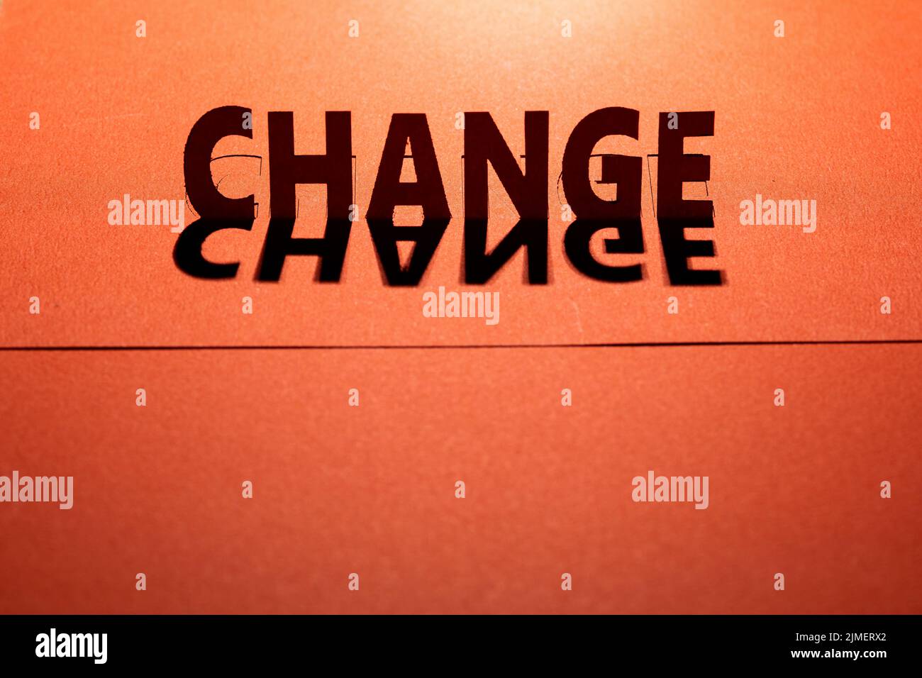 Change word cutting and standing from paper, lit from behind and ...