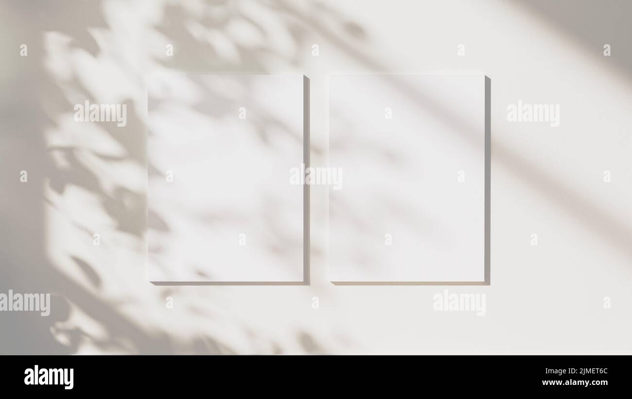 Blank posters mock up with leaves shadows and sunlight on neutral white ...