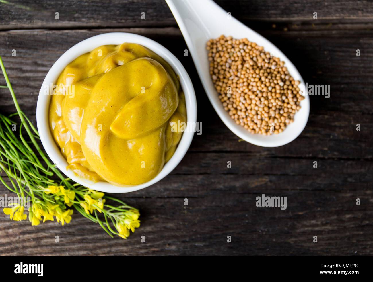 Mustard sauce and flowers and their ingredients Stock Photo - Alamy