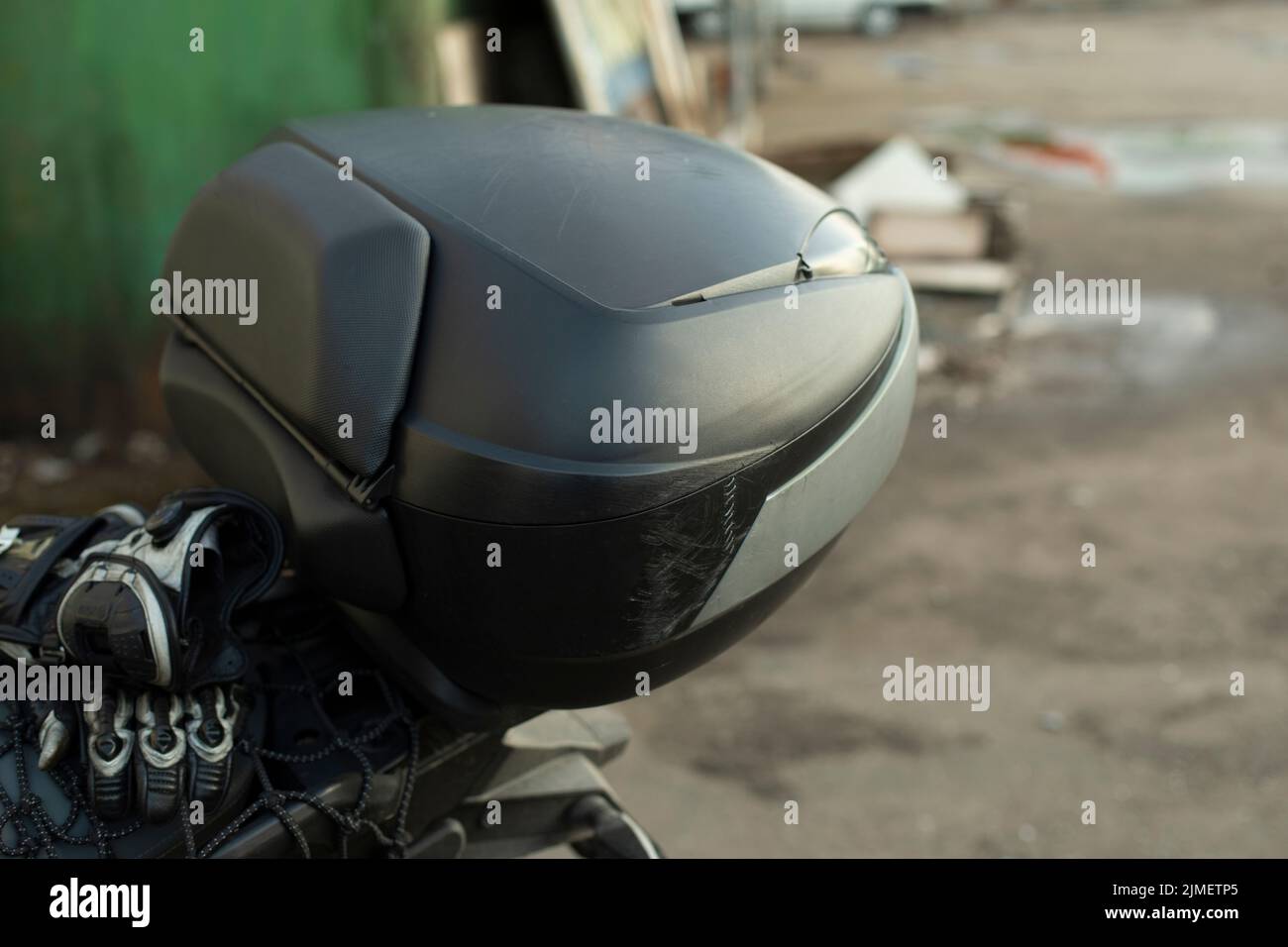 Trunk on motorcycle. Details of bike. Transport in parking lot. Storage ...