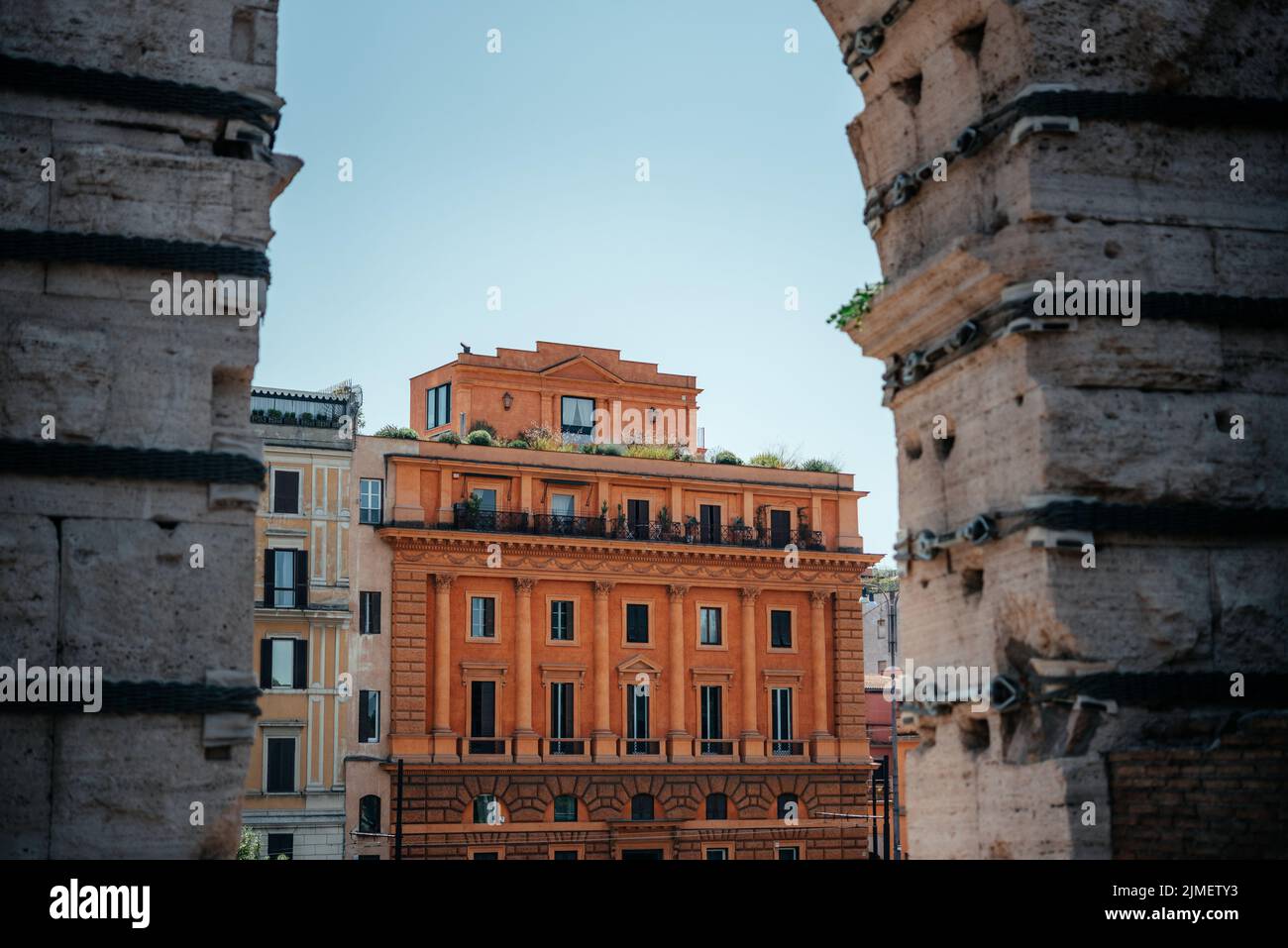 A view to Colorful Buildings in Rome, Italy through the ancient walls ...