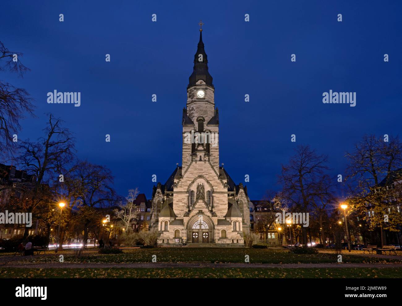 The illuminated Michaeliskirche on the Nordplatz in Leipzig Stock Photo ...