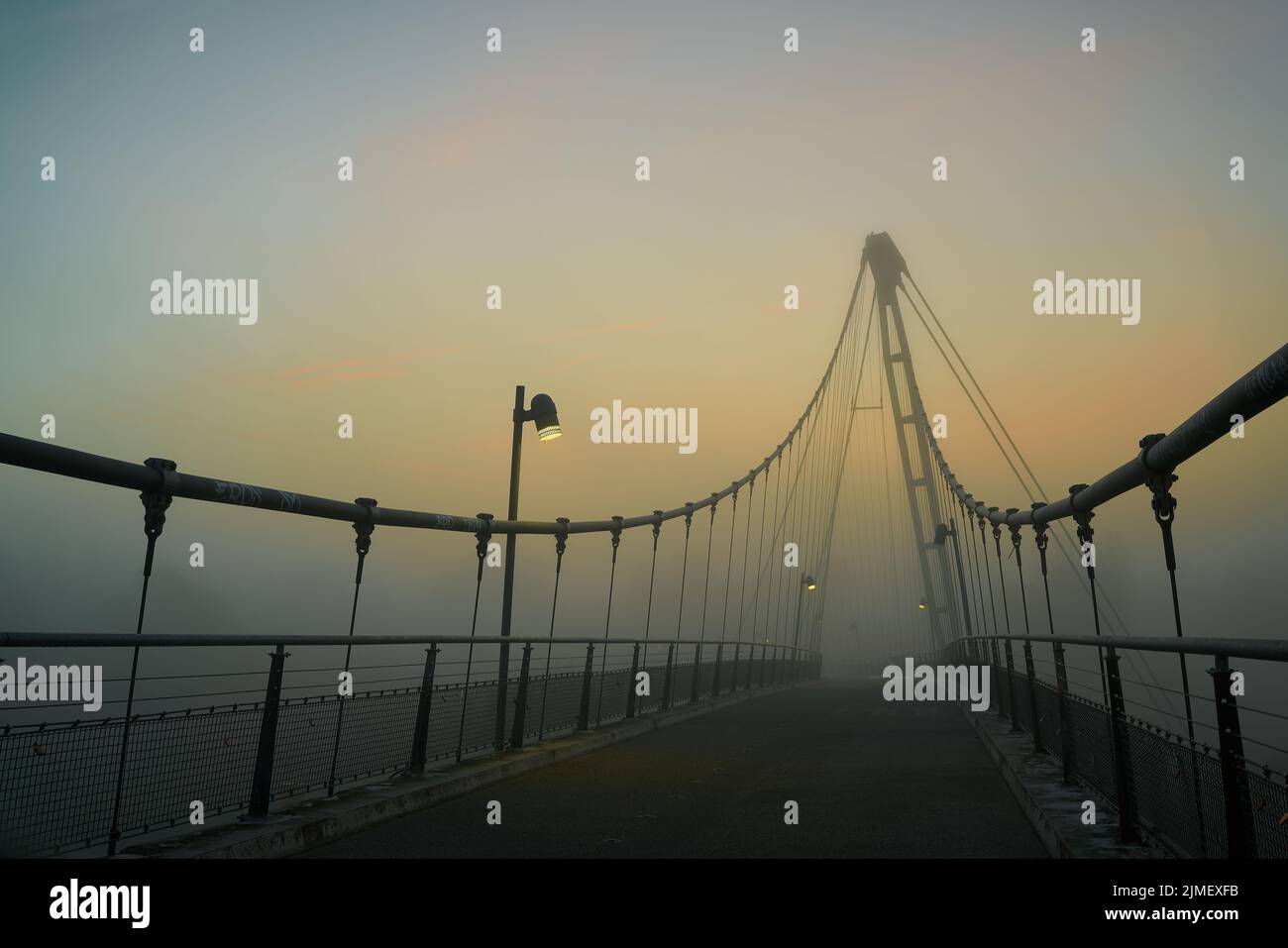 The Herrenkrugsteg, a suspension bridge over the river Elbe on the Elbe ...