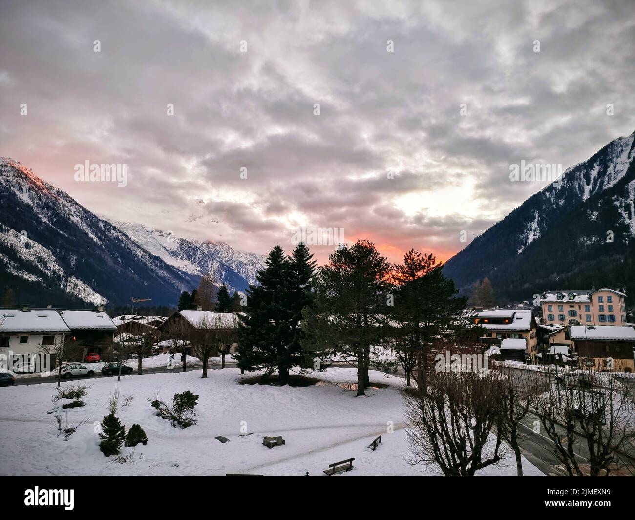 The view of the snow-covered Chamonix resort area on a cloudy day in ...