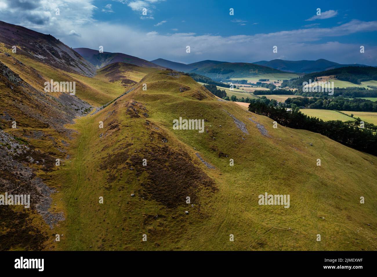 High above the valley of the River Tweed, the ruins of Tinnis Castle or ...