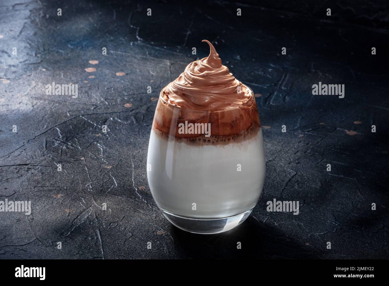 Dalgona cold coffee on a black background. Sweet Korean drink Stock ...