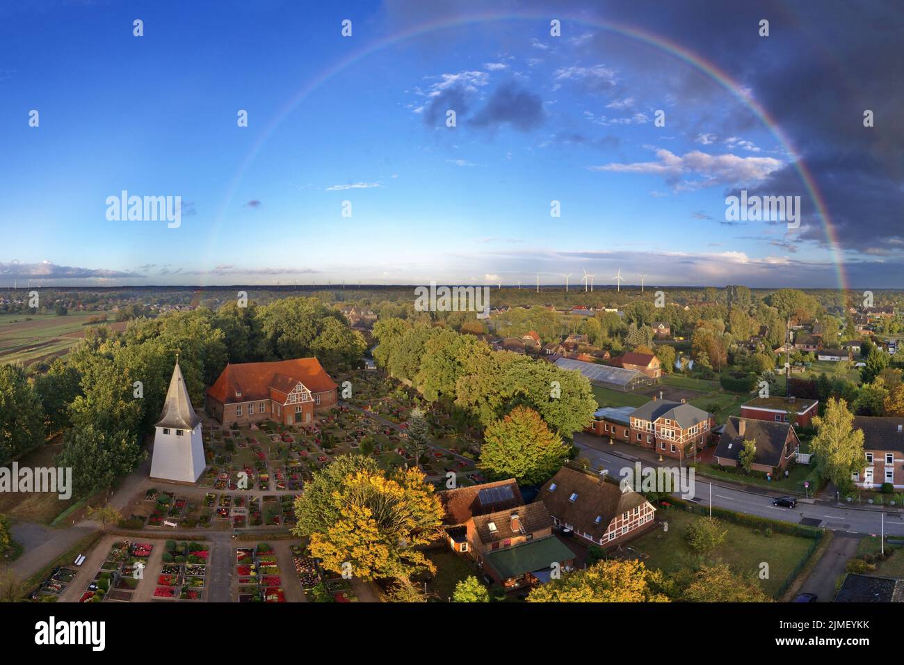 The aerial view of the rainbow arch over the Hamburg city buildings and ...