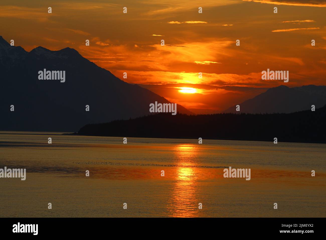 Alaska, sunset in Favorite Channel Stock Photo - Alamy