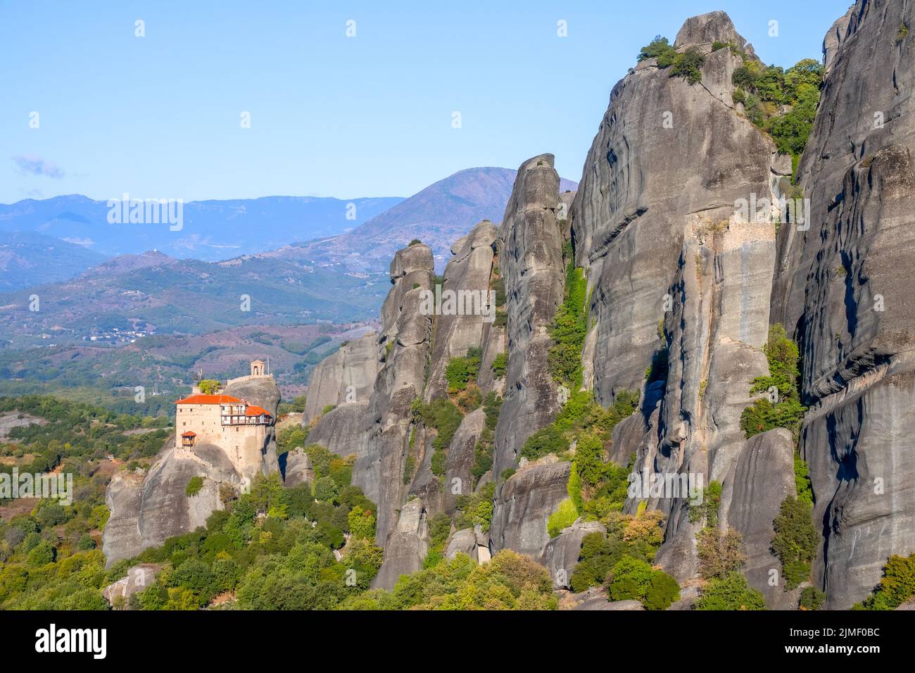 Mountain Wall and Monastery on the Cliff Stock Photo - Alamy