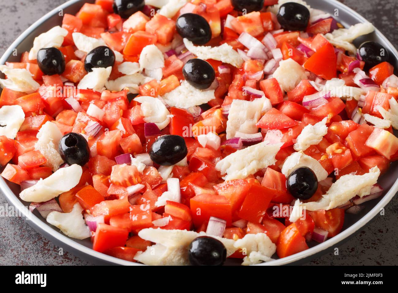 Esqueixada cod salad a typical recipe of Catalan gastronomy close-up in ...