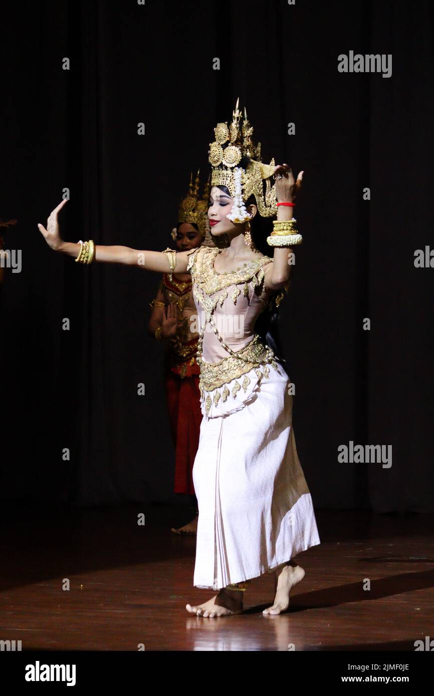 The vertical of a female dancer performing Lakhon Khol masked theatre ...