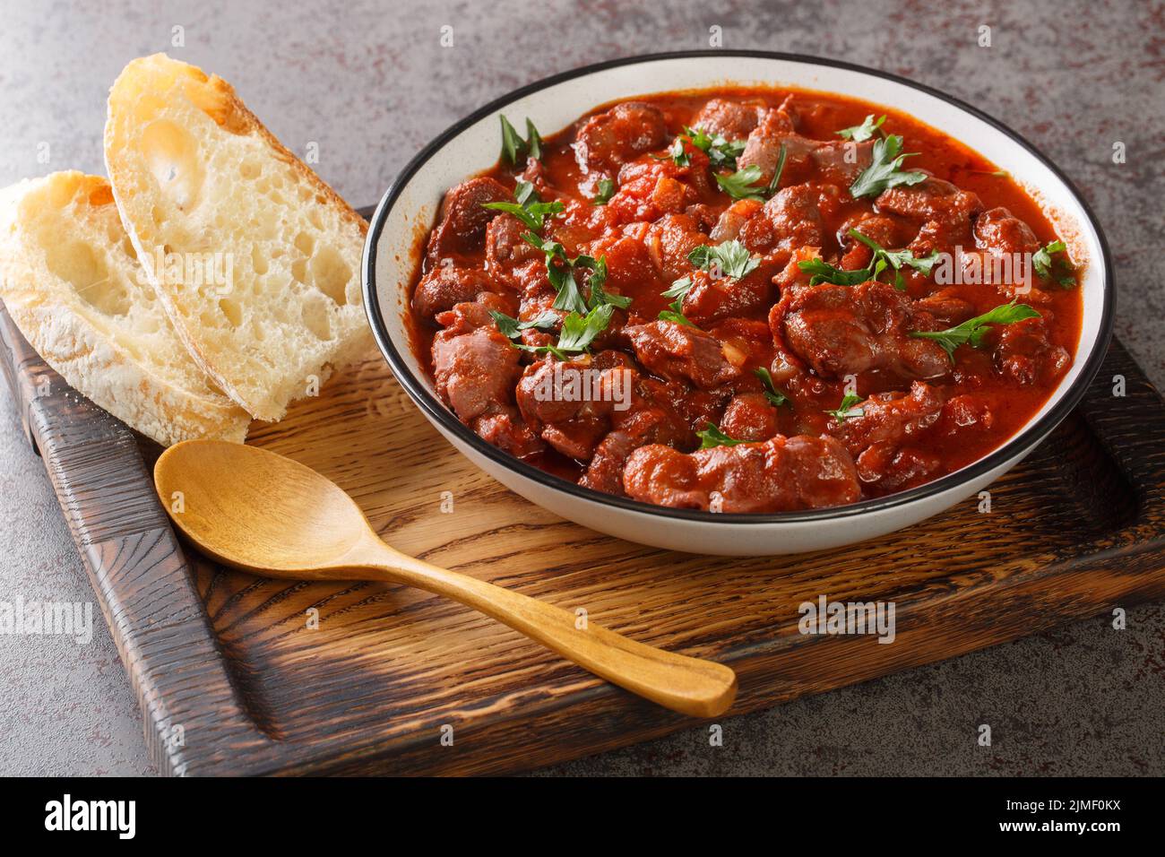 Brazilian portuguese food Moelas Guisadas stewed chicken gizzards in ...
