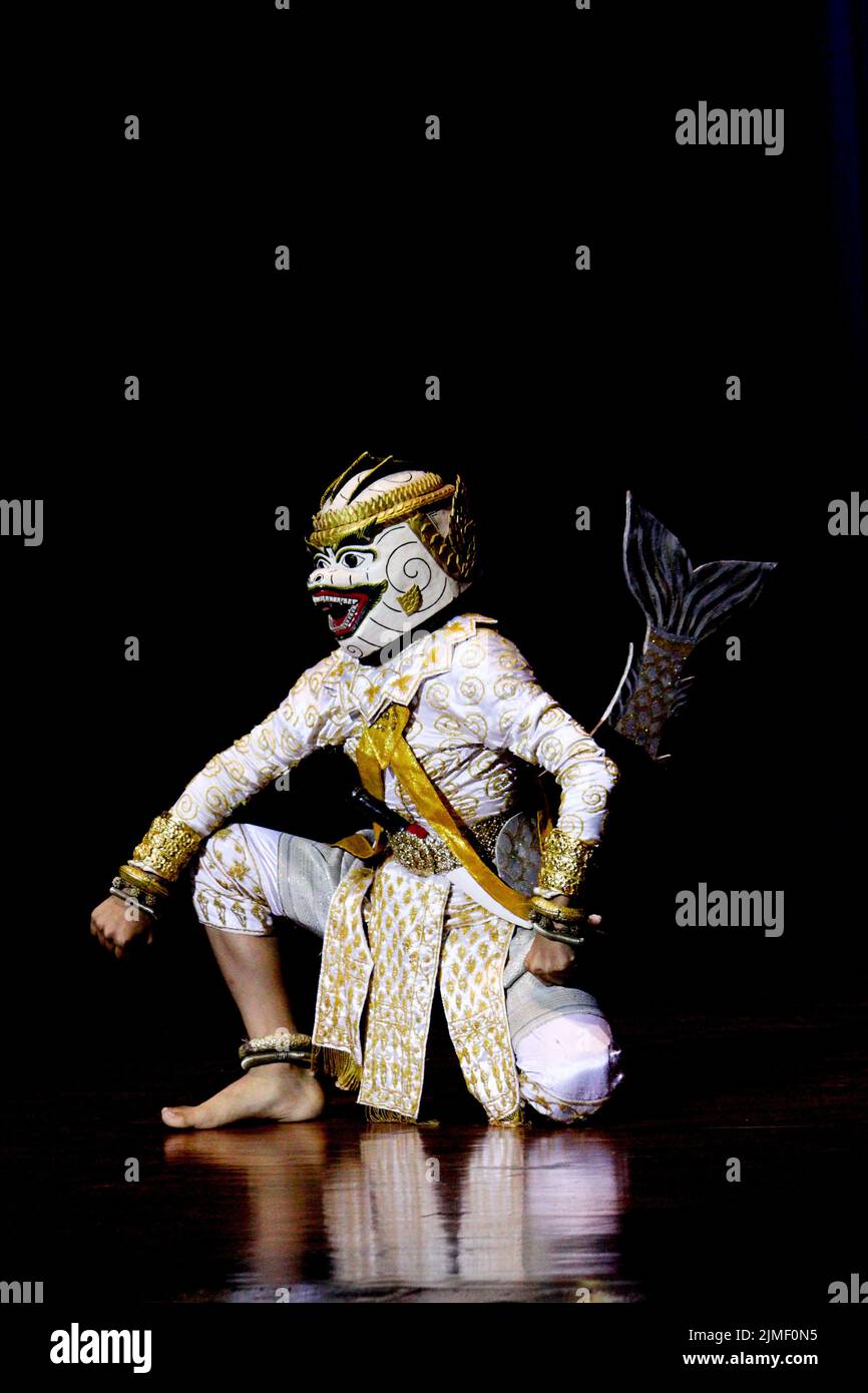 The vertical of a male dancer performing Lakhon Khol masked theatre in ...