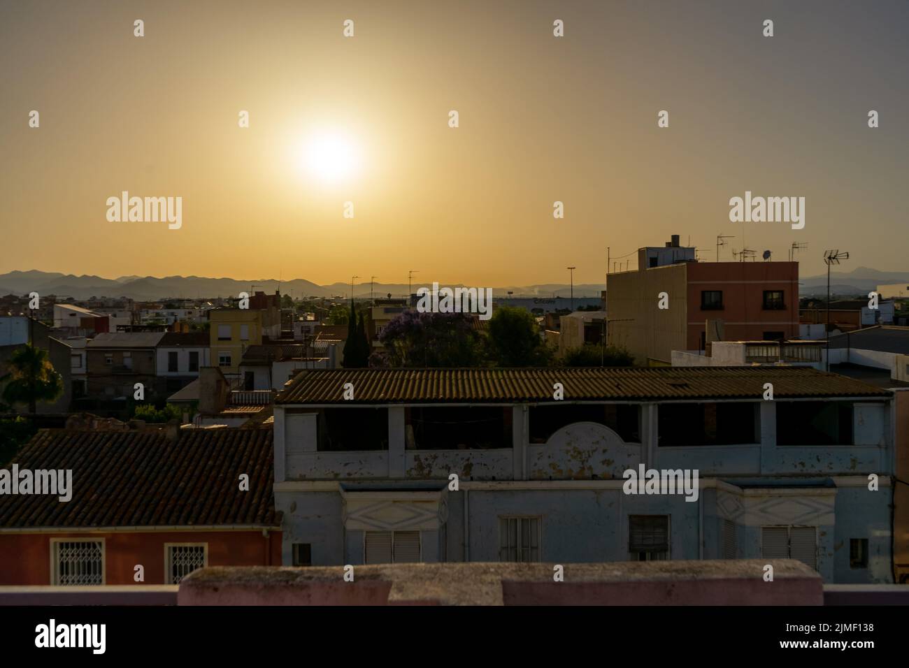 Nice sunset with clear sky in the small town of Las Alquerias in Spain ...