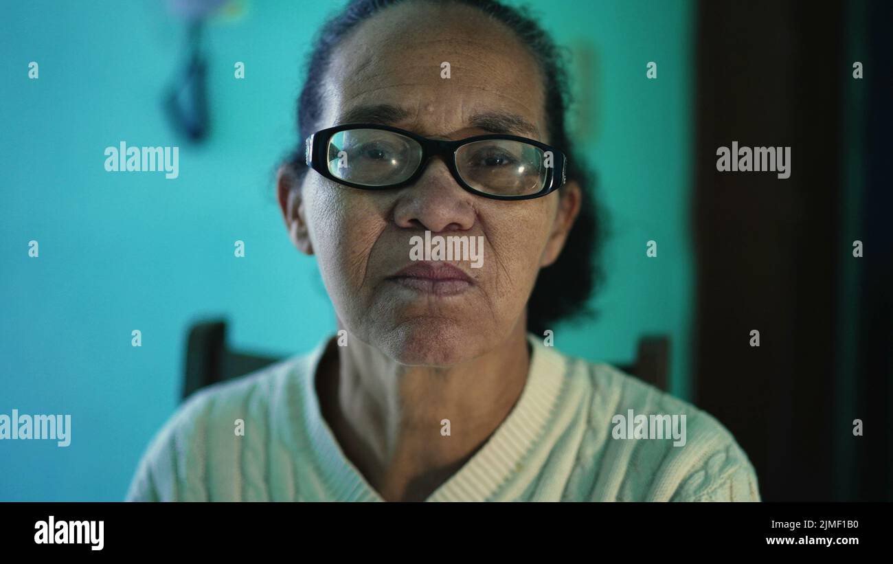 Elderly hispanic woman sad hi-res stock photography and images - Alamy
