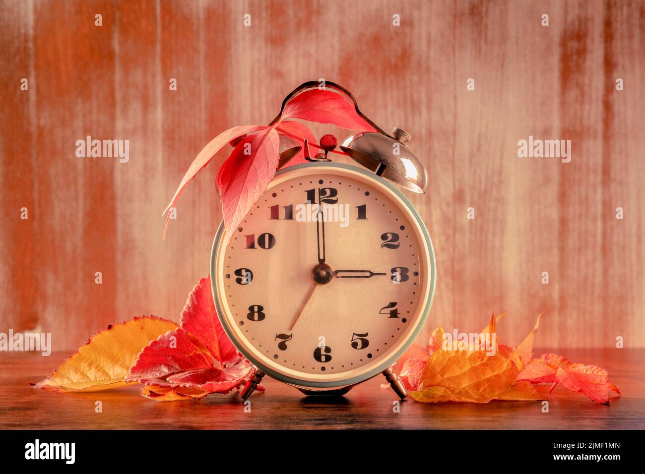 Daylight Savings Time concept, fall back in autumn, toned image Stock ...